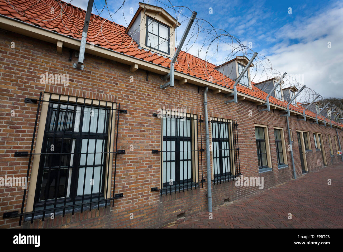 Prison cells with bars and barbed wire of Prison Museum at Veenhuizen ...