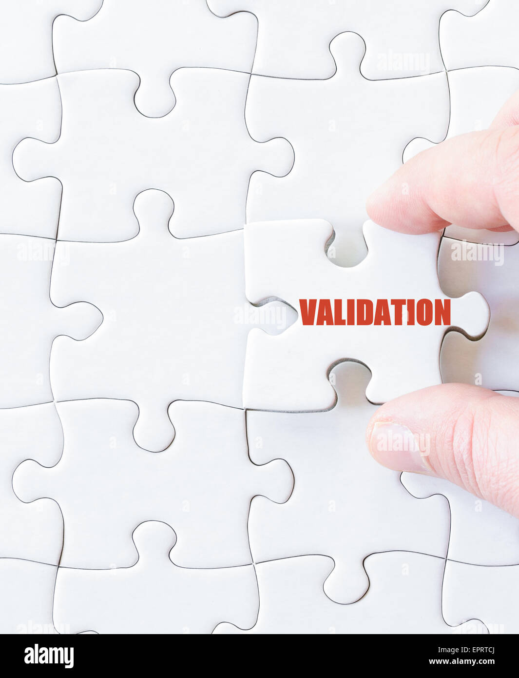 Last puzzle piece with word VALIDATION. Concept image Stock Photo - Alamy