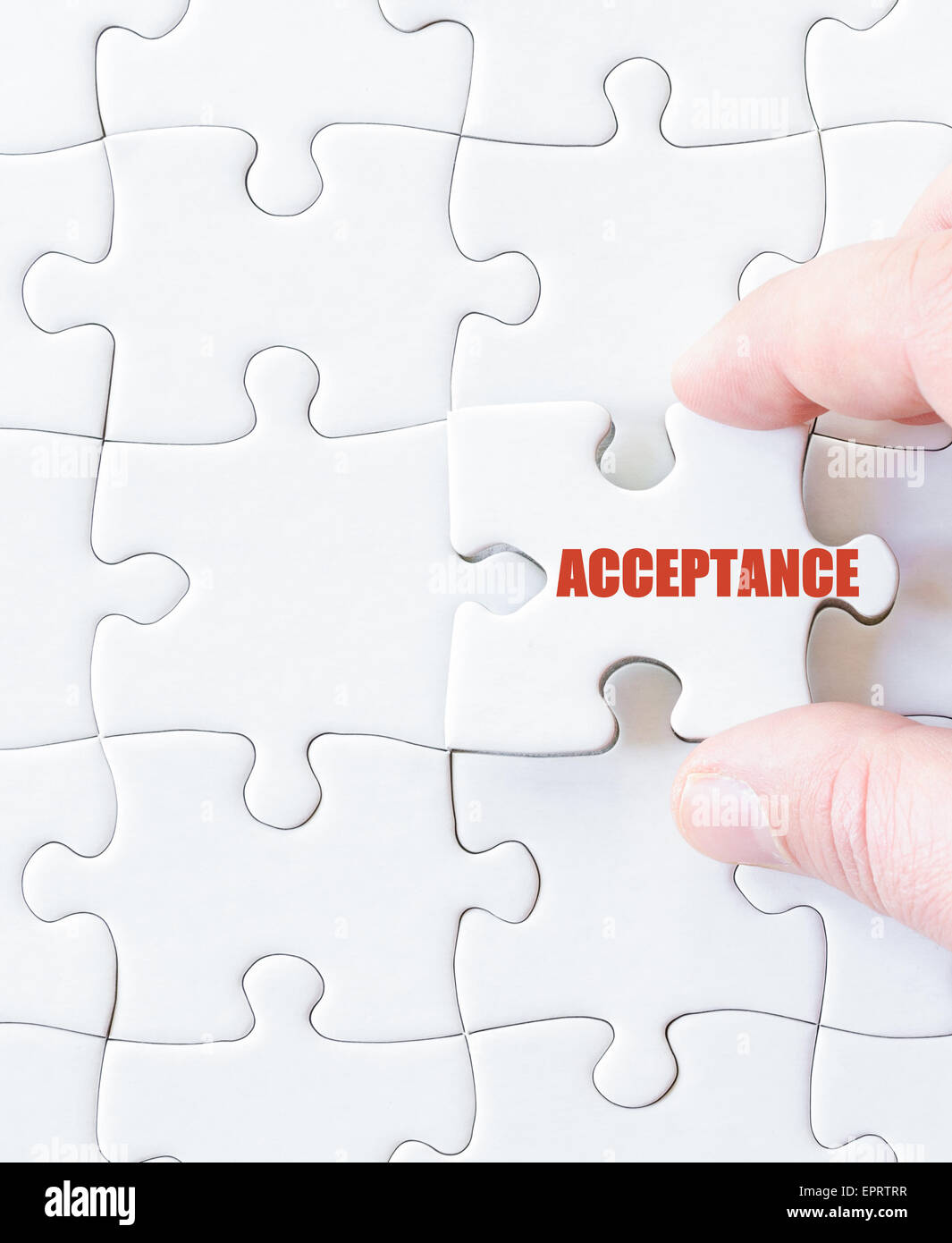 Last puzzle piece with word ACCEPTANCE. Concept image Stock Photo - Alamy