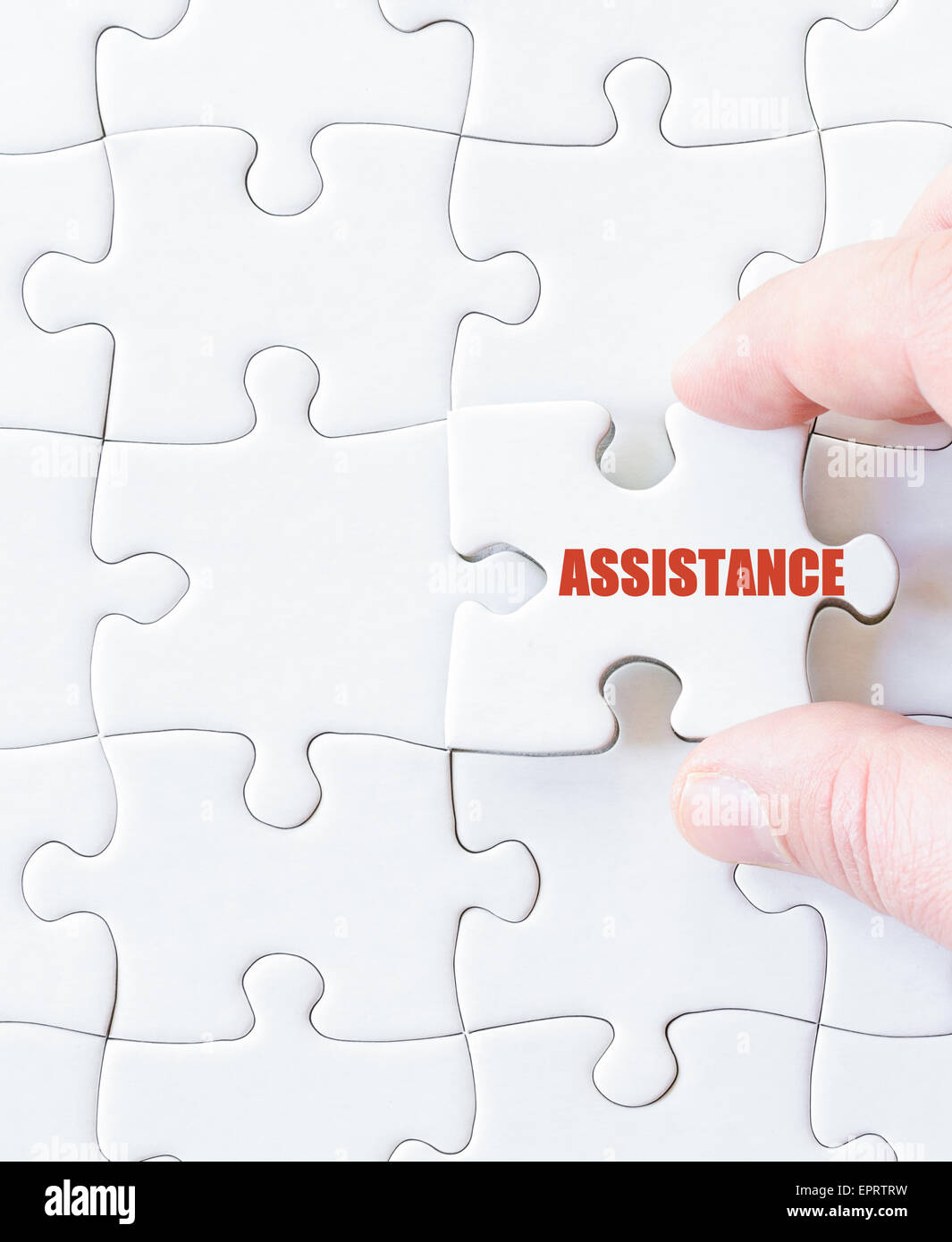 Last puzzle piece with word ASSISTANCE. Concept image Stock Photo - Alamy