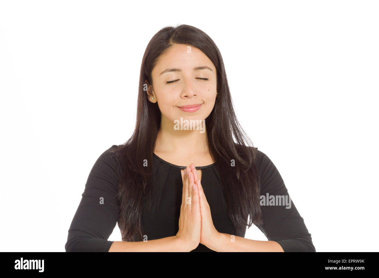 Model isolated on plain background in studio wishing praying Stock ...