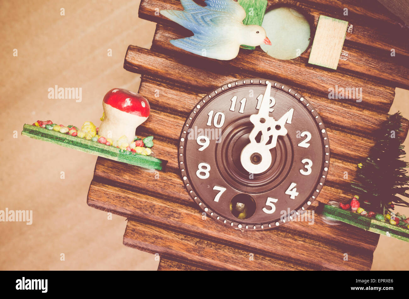 cuckoo wall clock dial close up, one o'clock Stock Photo - Alamy