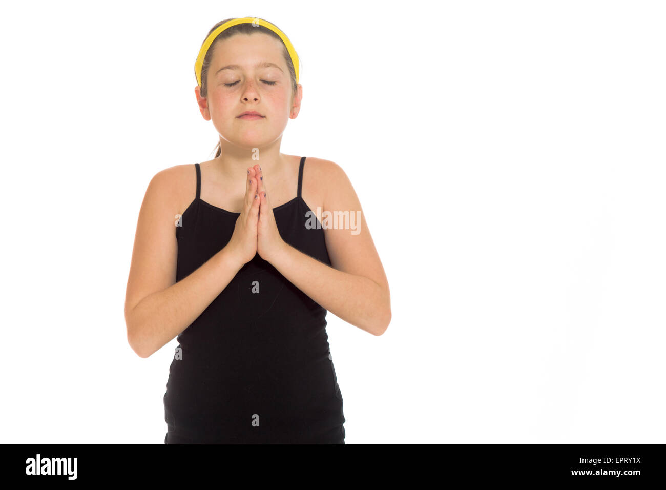 Model isolated on plain background in studio wishing praying Stock ...