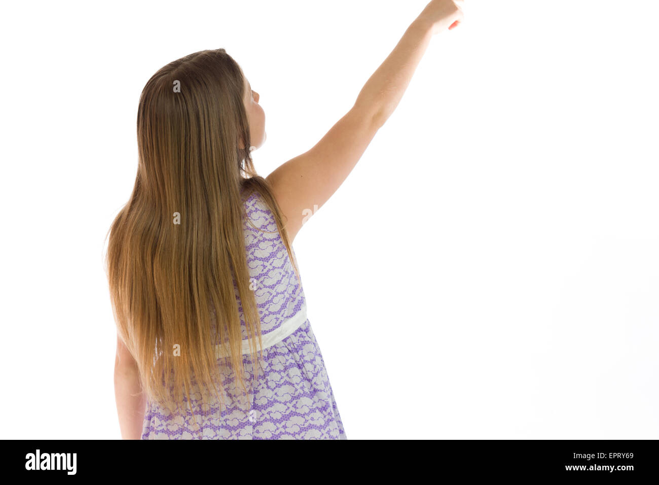 Model isolated on plain background in studio from rear pointing Stock ...