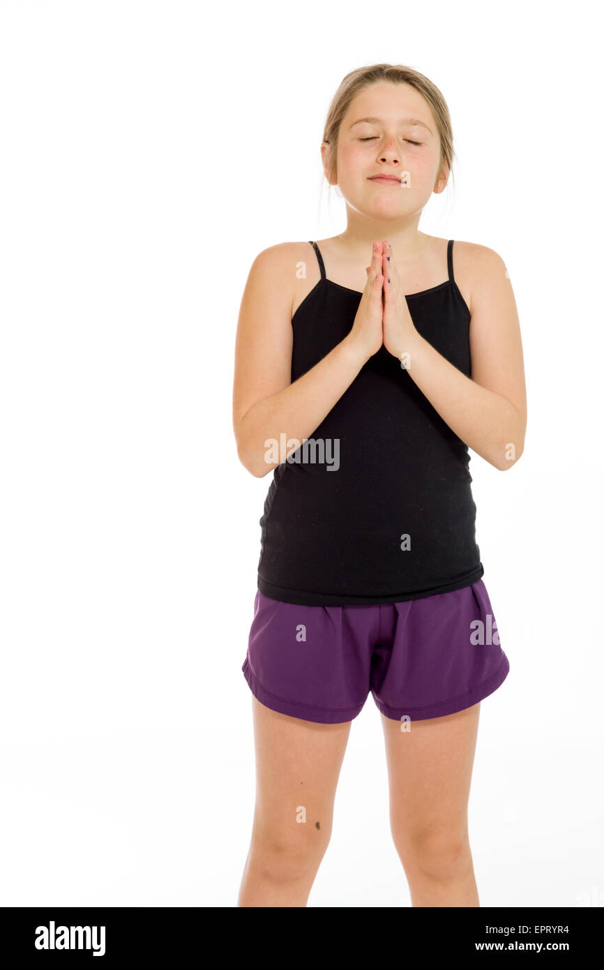 Model isolated on plain background in studio wishing praying Stock ...