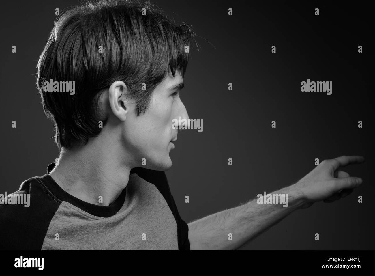 Model isolated back pointing Stock Photo - Alamy