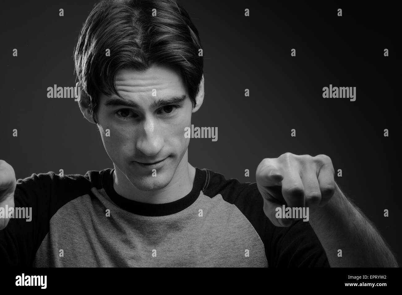 Model pointing to camera Stock Photo - Alamy