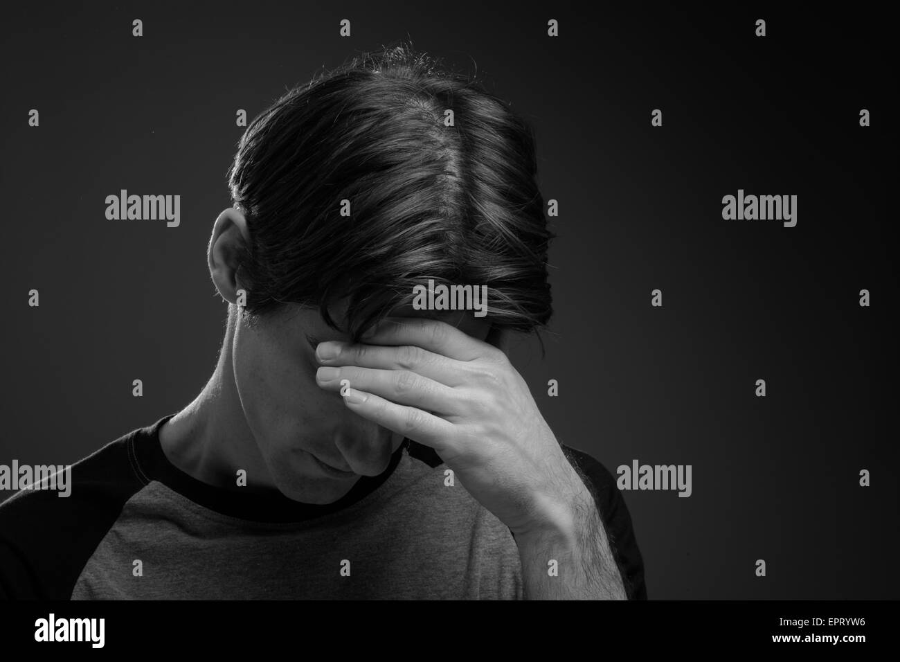 Model hiding face shame Stock Photo - Alamy