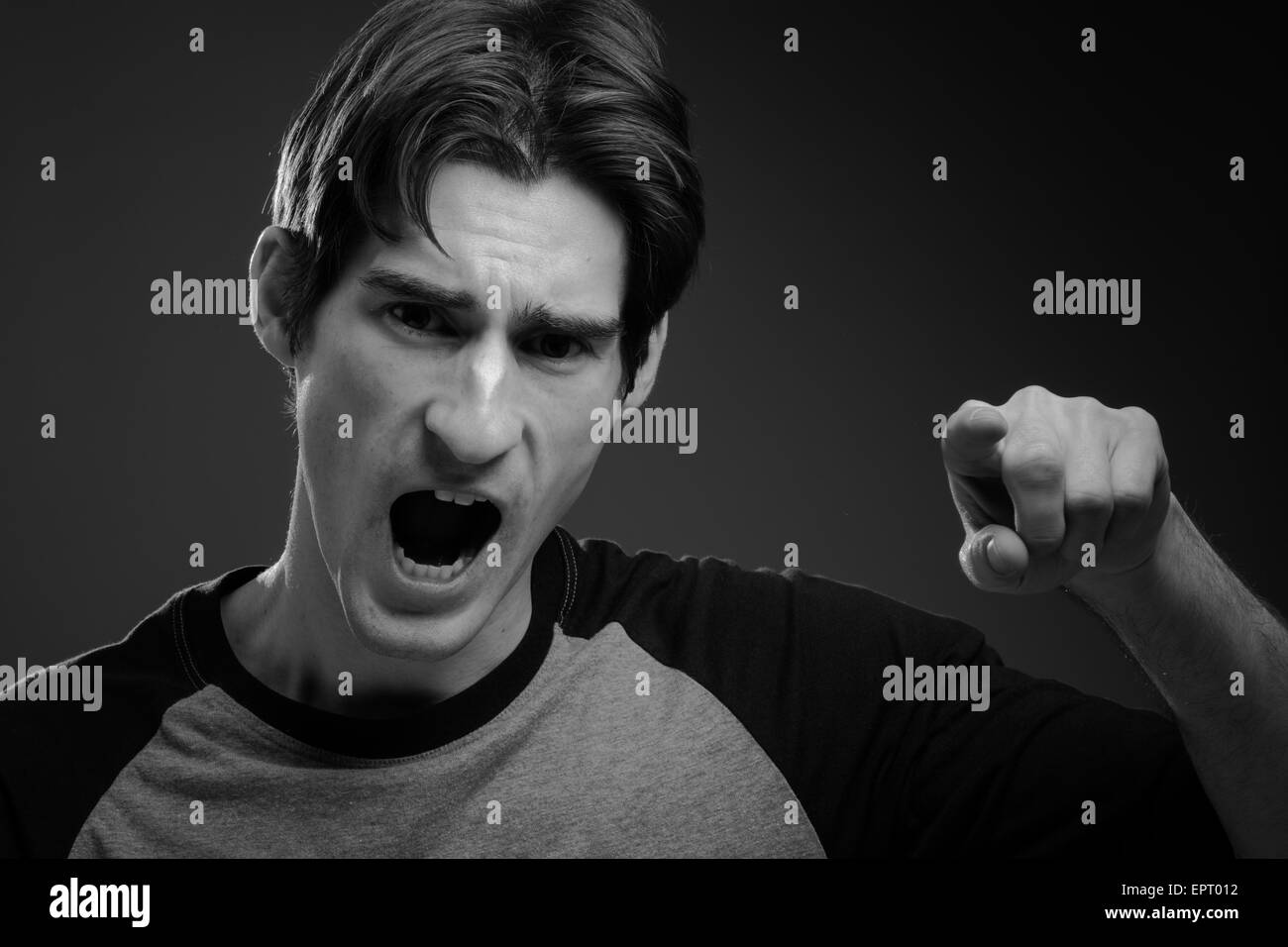 Model angry scolding and pointing Stock Photo - Alamy