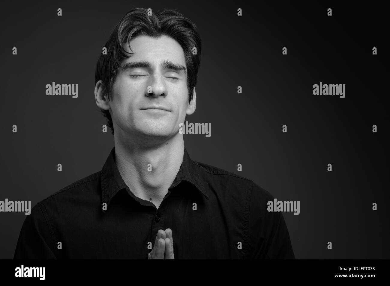 Model isolated praying Stock Photo - Alamy