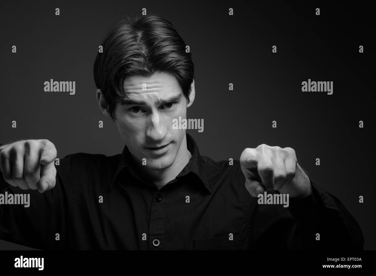 Model pointing to camera Stock Photo - Alamy