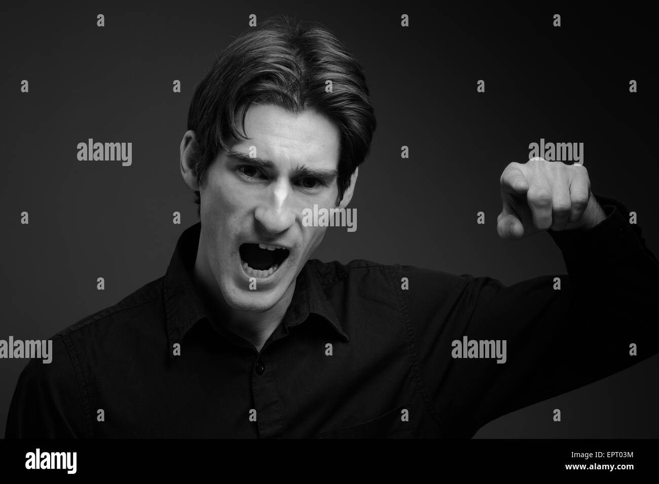 Model angry scolding and pointing Stock Photo - Alamy