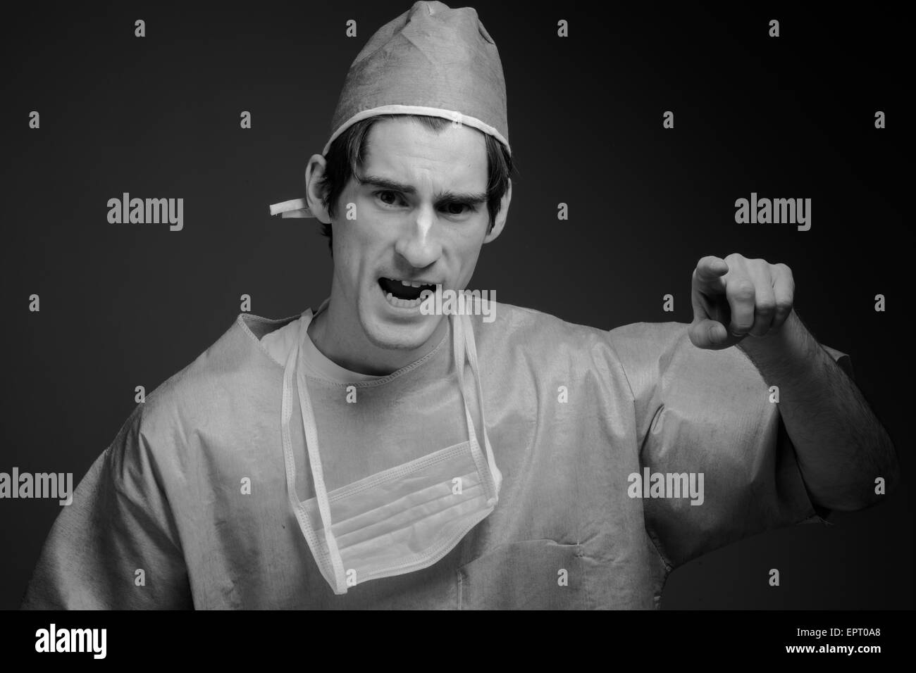 Angry pointing doctor hi-res stock photography and images - Alamy