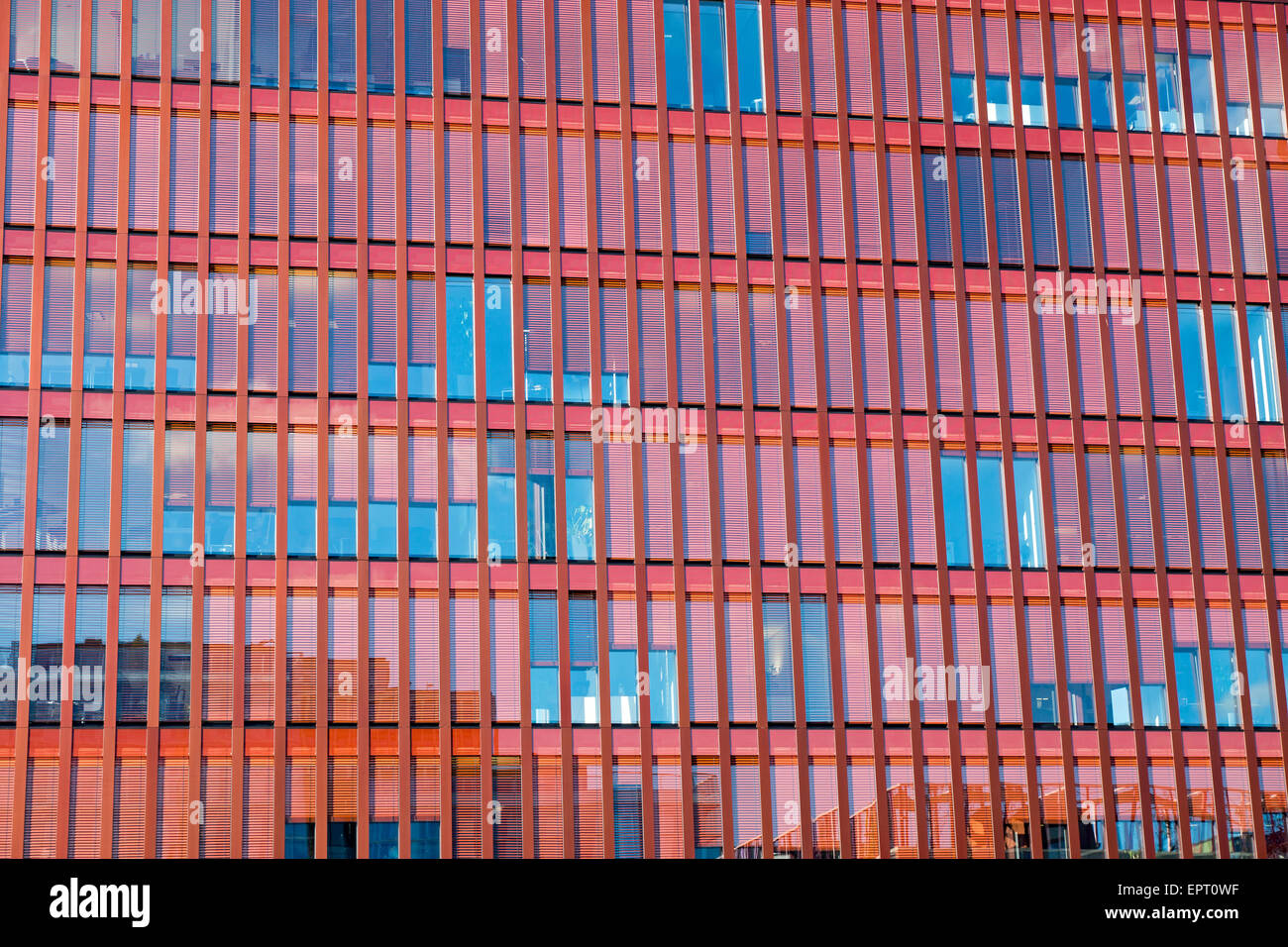 The red facade of a modern office building Stock Photo - Alamy