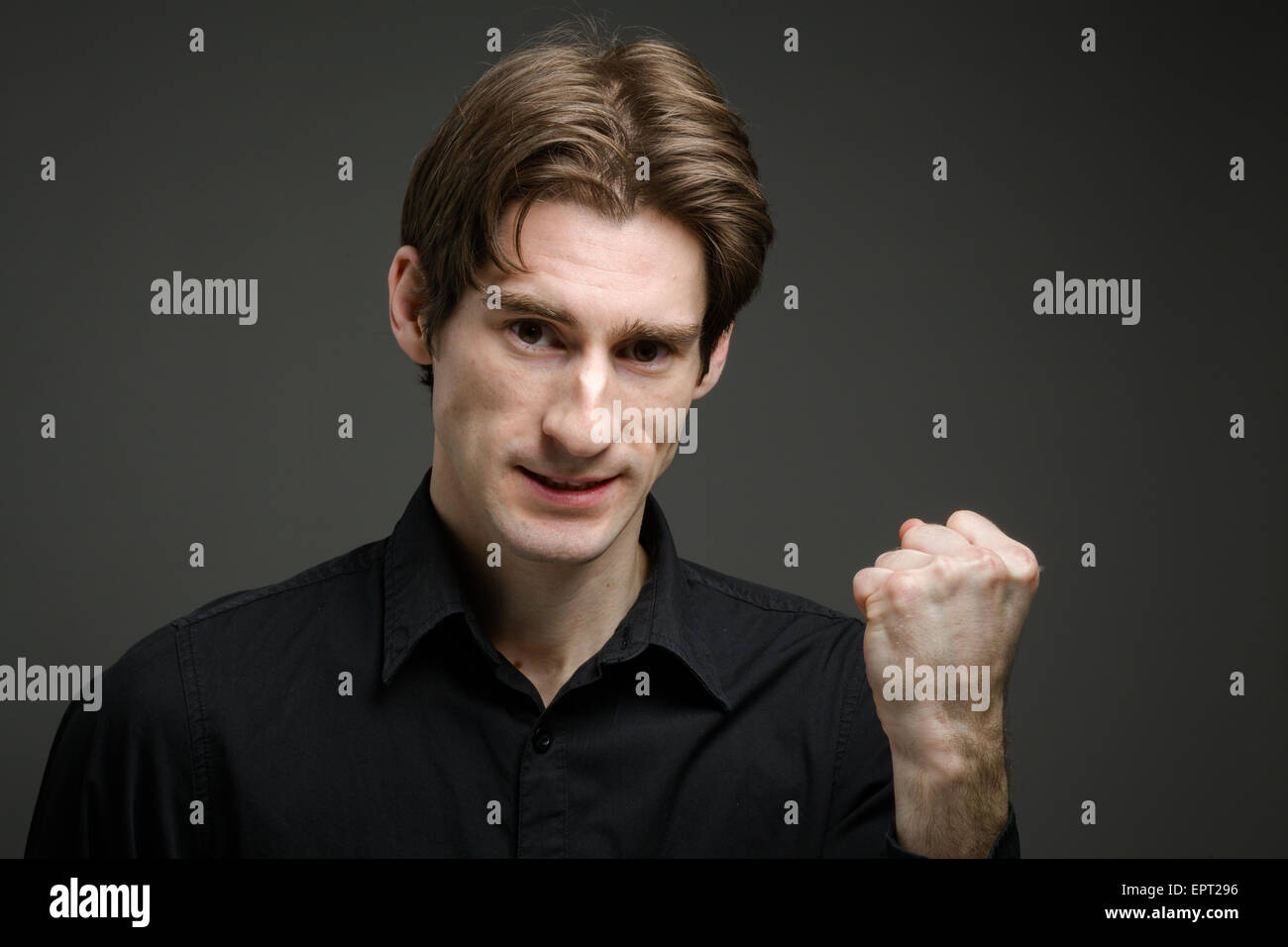 Model isolated on plain background in studio success Stock Photo - Alamy