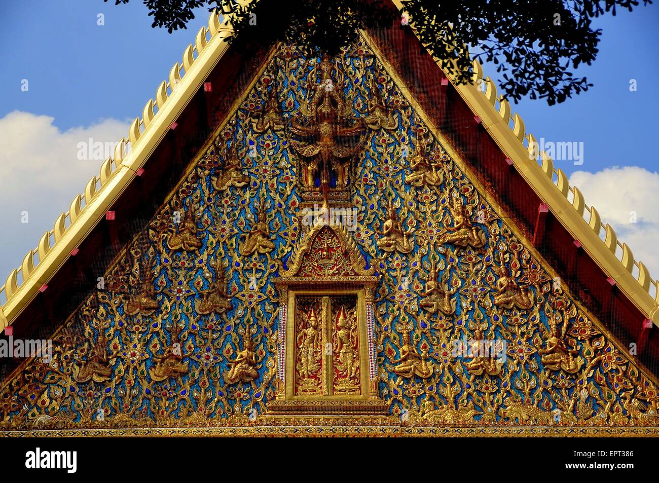 Bangkok, Thailand: Ubosot sanctuary hall tympanum decorated with gilded ...