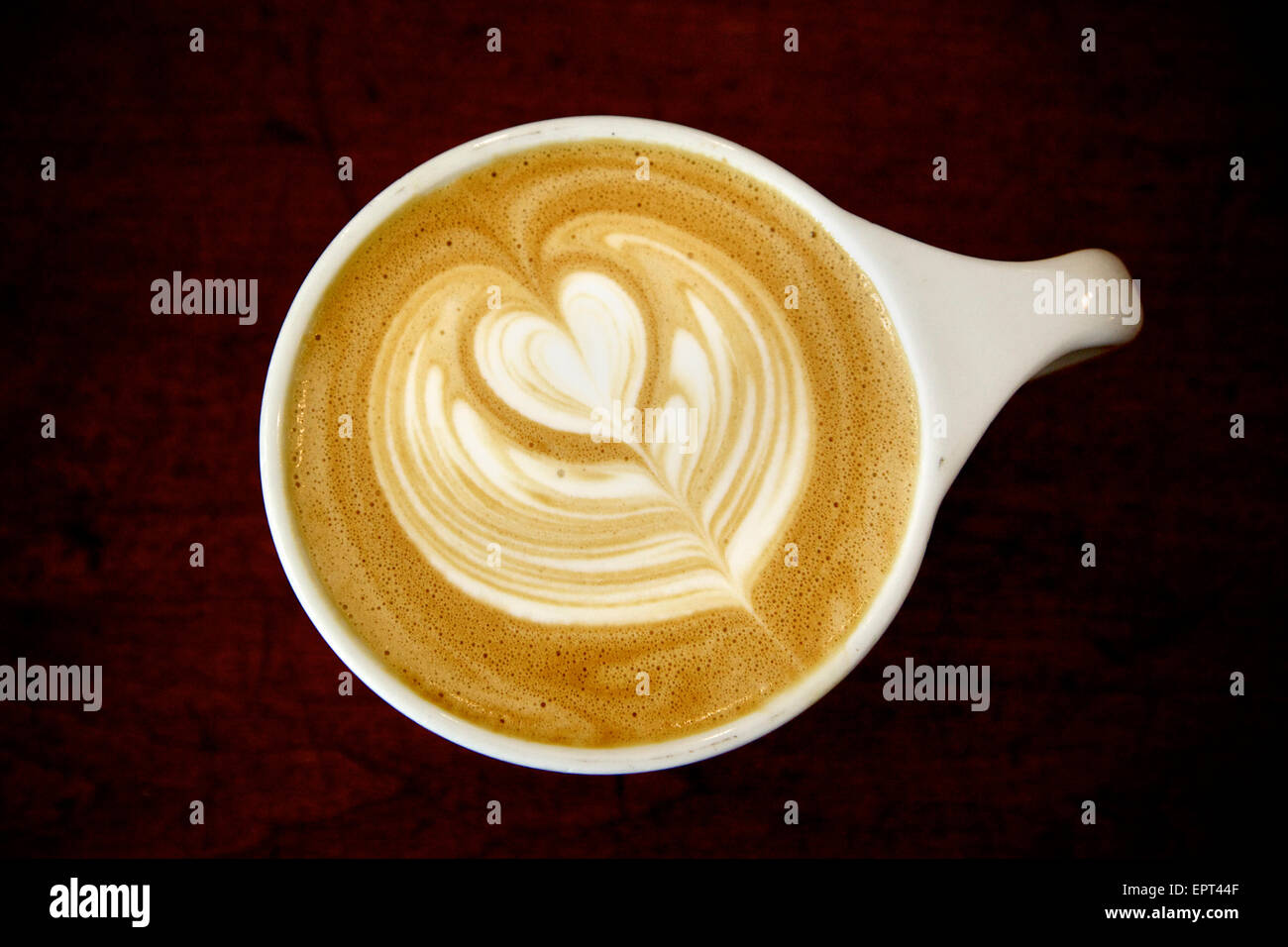Overhead View of Latte with Latte Art in Foam Stock Photo - Alamy