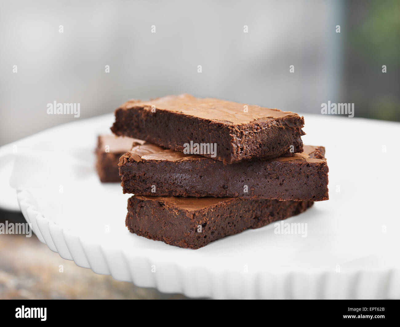 Stack of Chocolate Brownies on Cake Stand, Studio Shot Stock Photo - Alamy