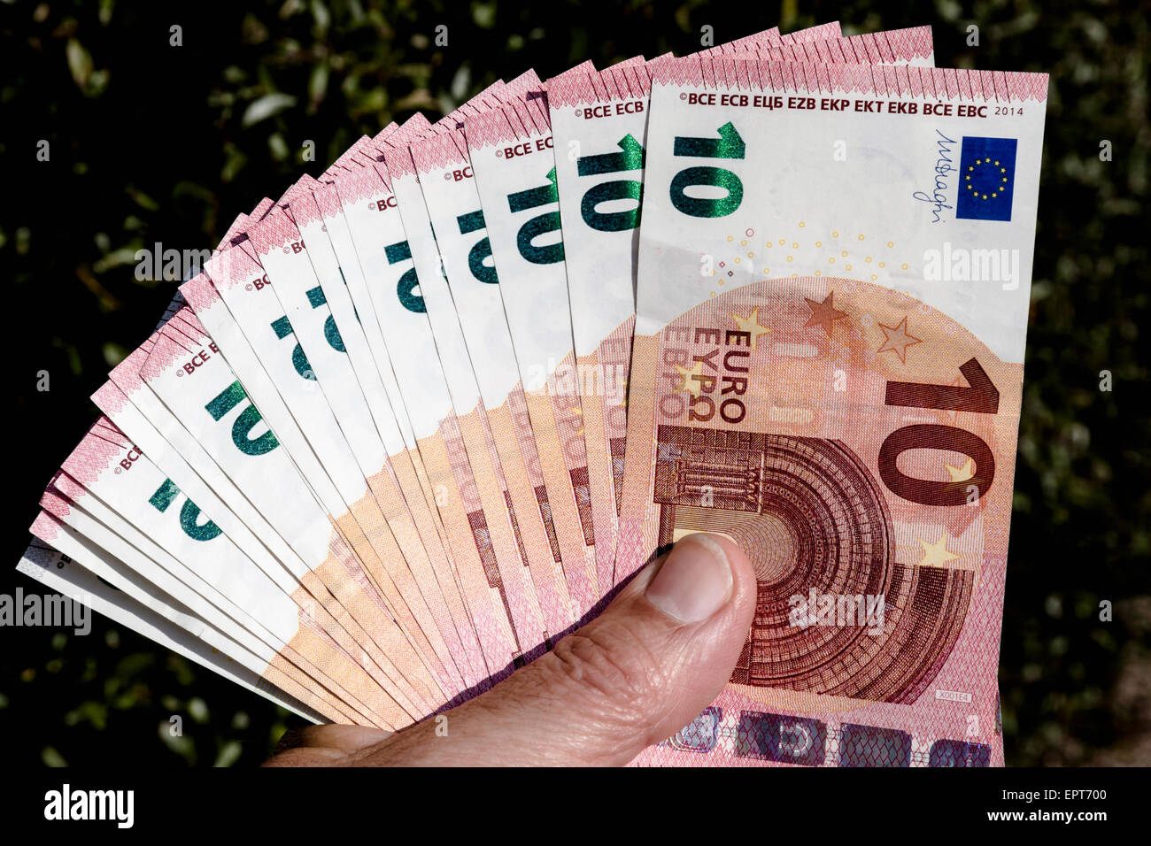 Handful of euro banknotes Stock Photo - Alamy
