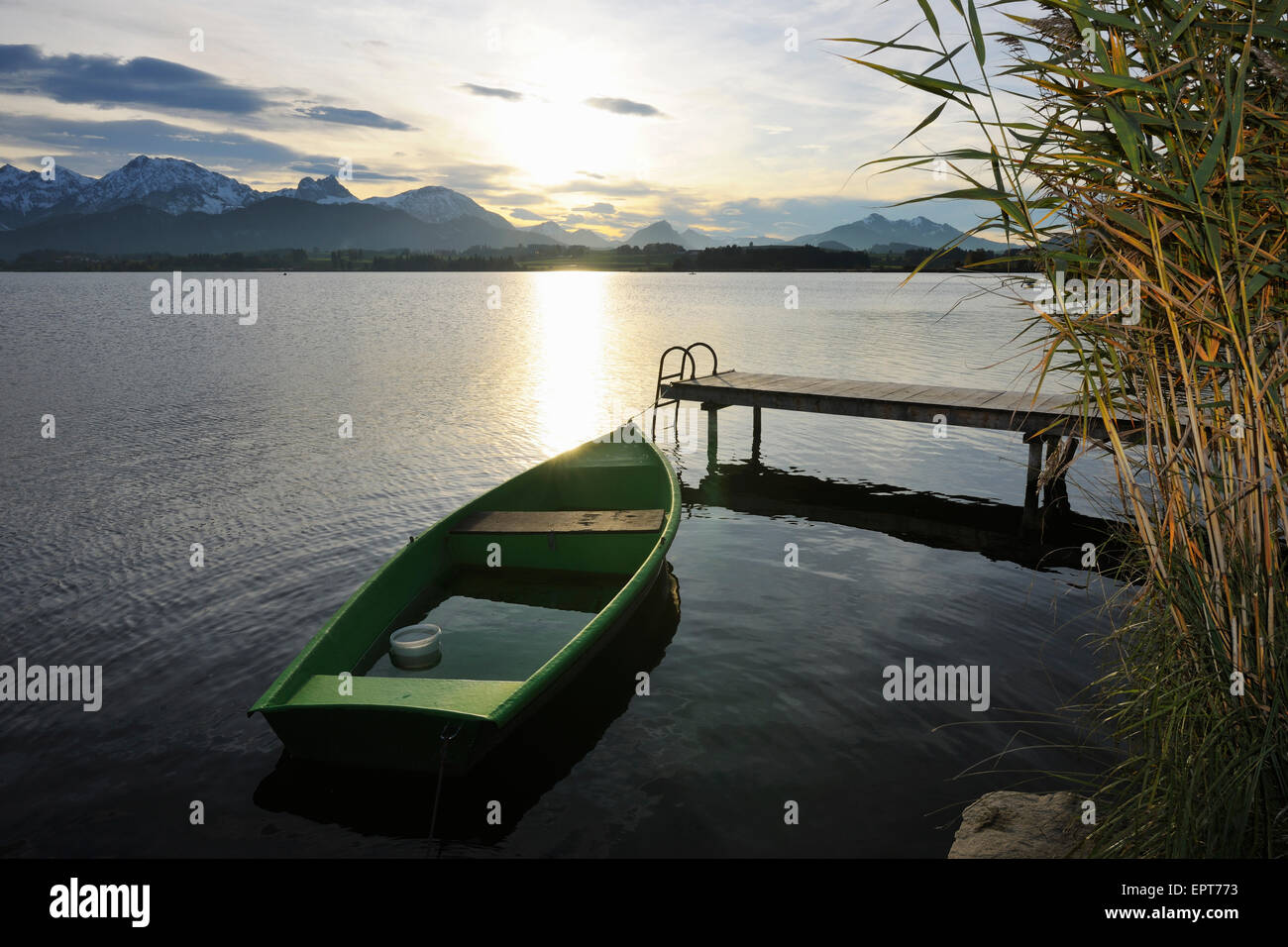 Rowboat with Sun Reflecting on Lake, Hopfen am See, Lake Hopfensee ...