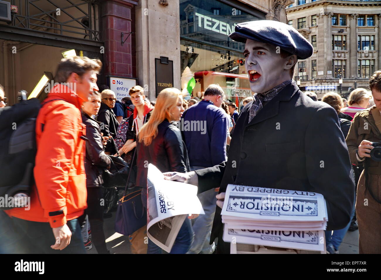 Handing out newspaper hi-res stock photography and images - Alamy