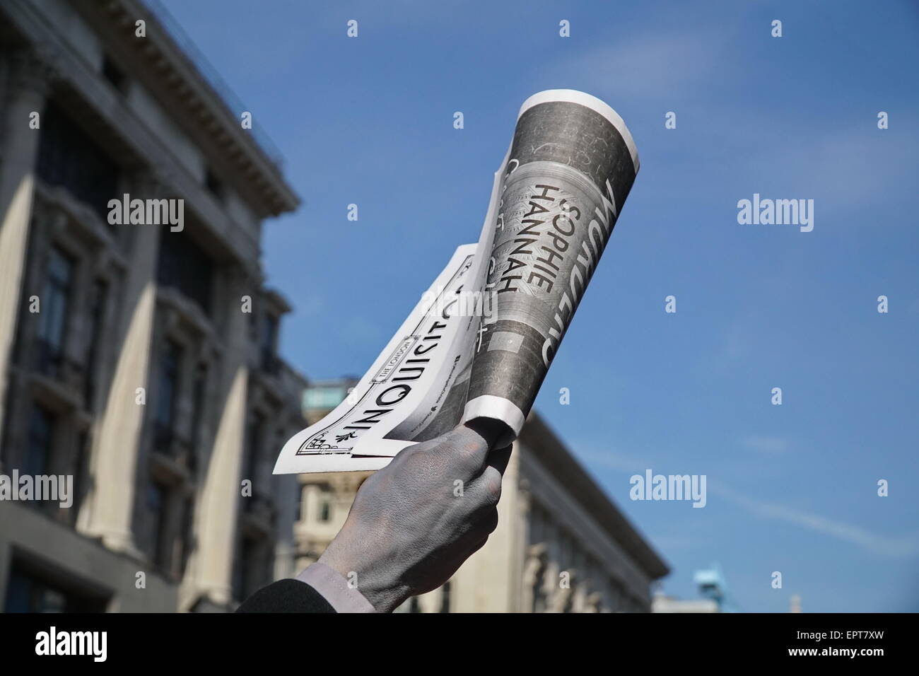 Handing out newspaper hi-res stock photography and images - Alamy