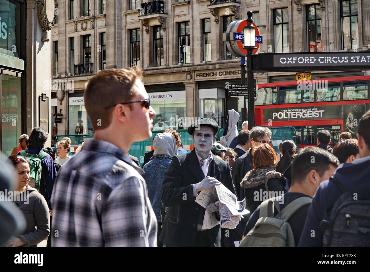 Handing out newspaper hi-res stock photography and images - Alamy