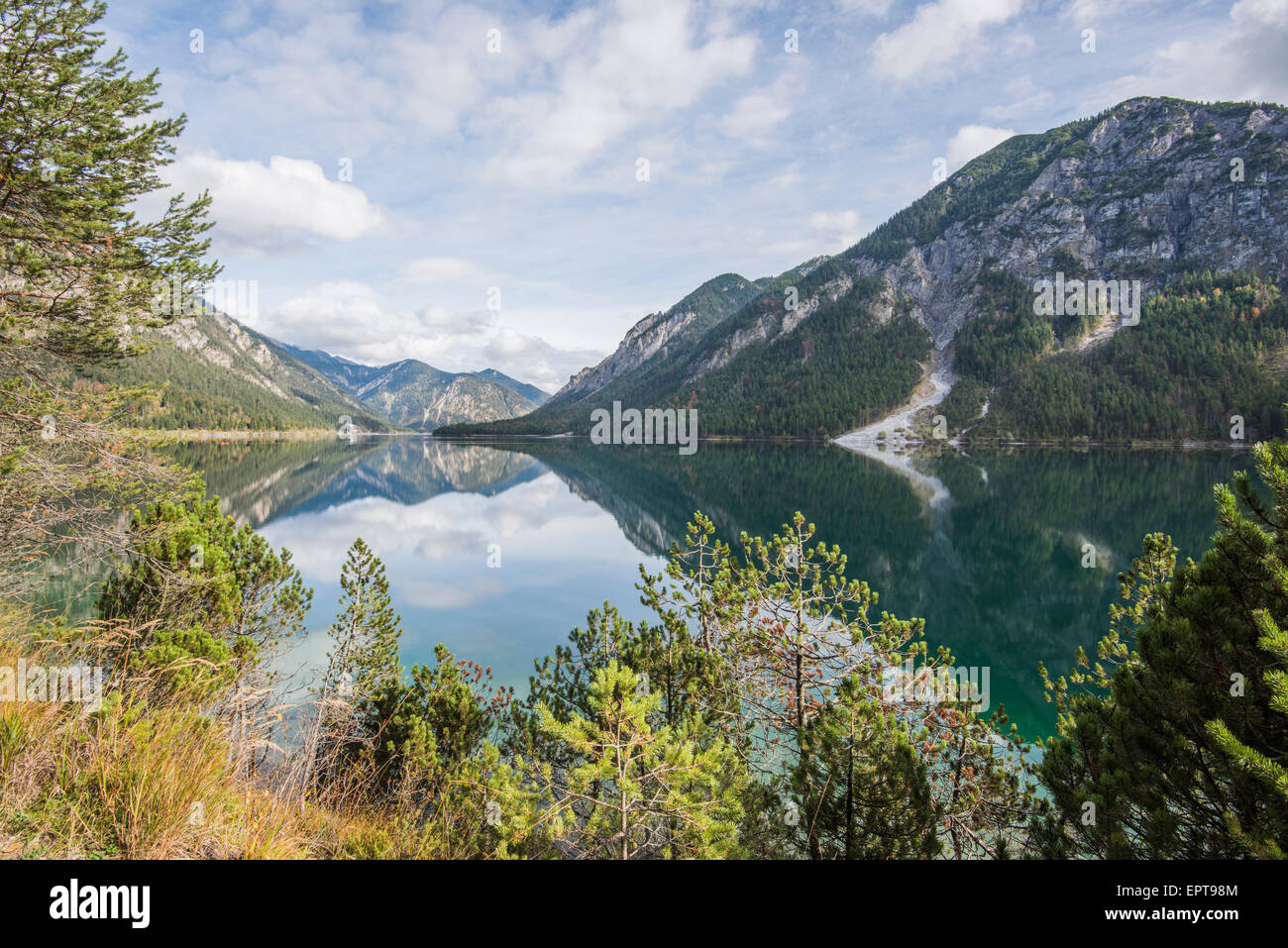 Landscape of a clear lake in autumn, Plansee, Tirol, Austria Stock ...