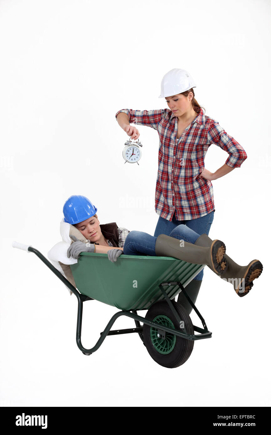 Woman in a wheelbarrow Stock Photo - Alamy