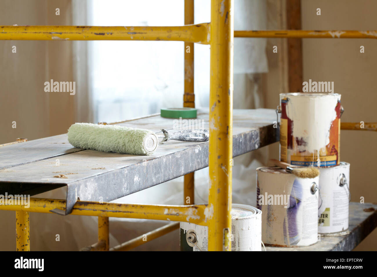 Scaffolding with Paint Cans and Paint Roller for Home Renovation Stock ...