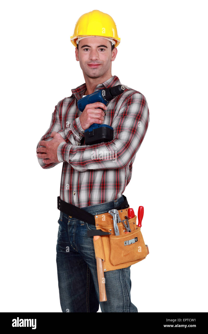 Handyman posing with cordless drill Stock Photo - Alamy