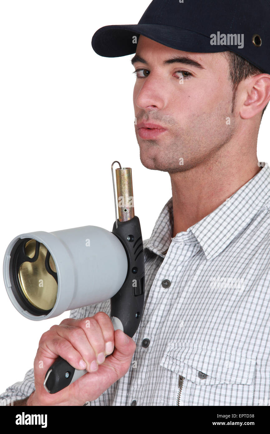 Man with blowtorch Stock Photo - Alamy