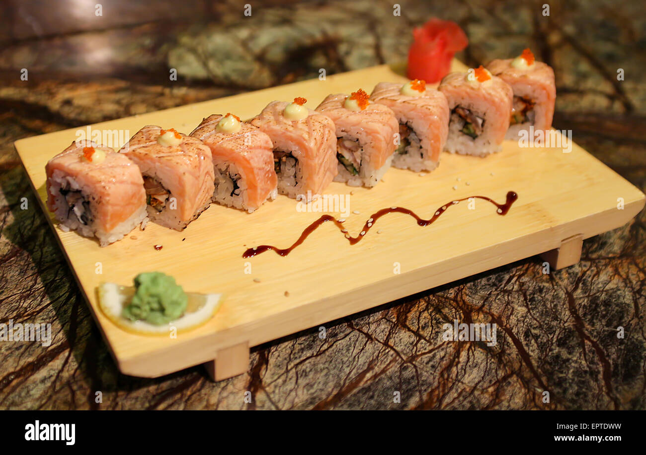 Delicious Sapporo maki sushi rolls served with a wood plate Stock Photo ...
