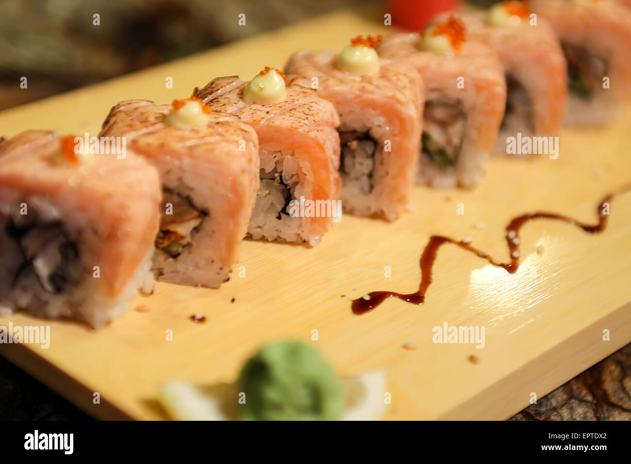 Delicious Sapporo maki sushi rolls served with a wood plate Stock Photo ...
