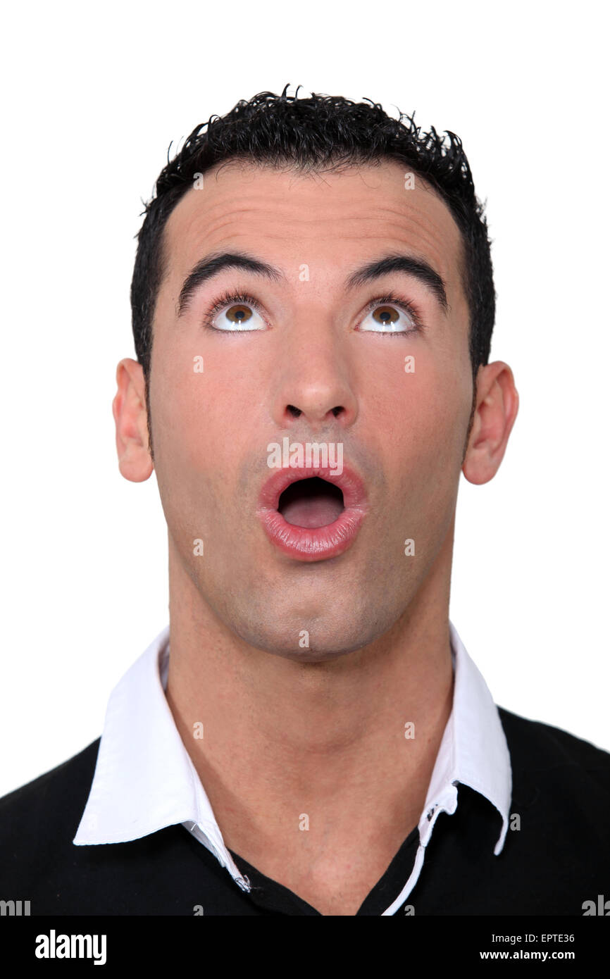 Man looking up Stock Photo - Alamy