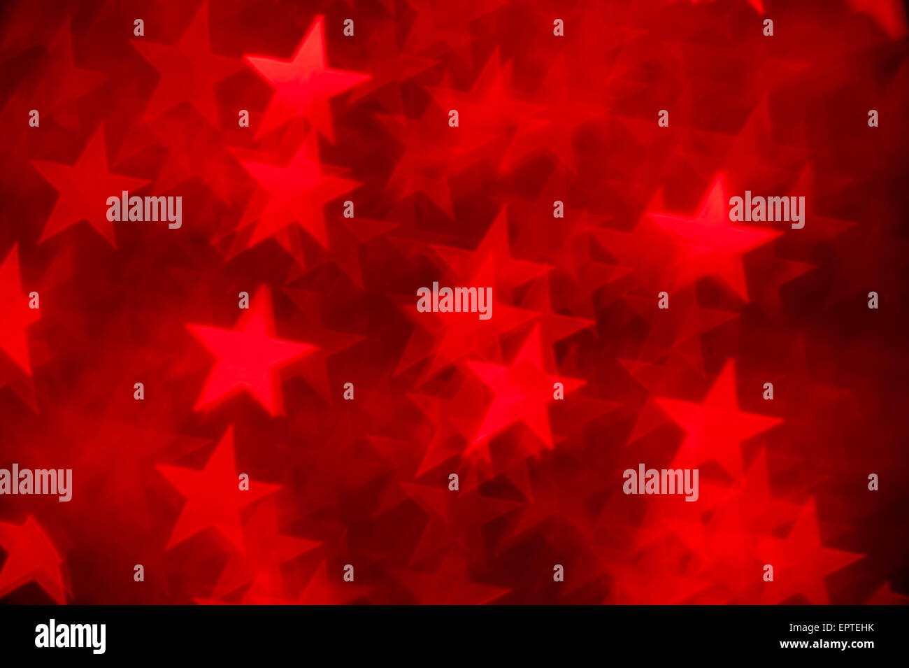 red star shape as background Stock Photo - Alamy