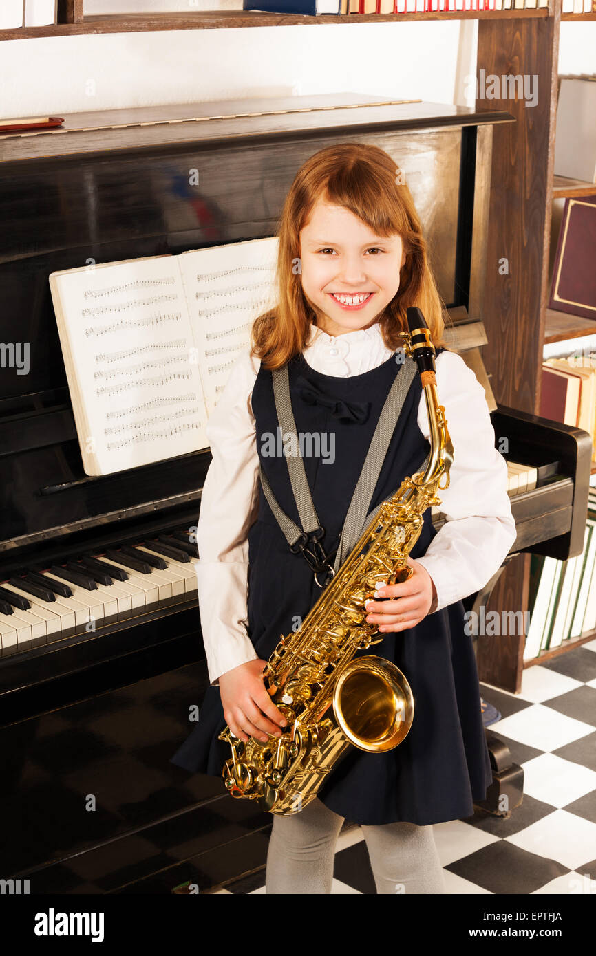 Children playing saxophone hi-res stock photography and images - Alamy