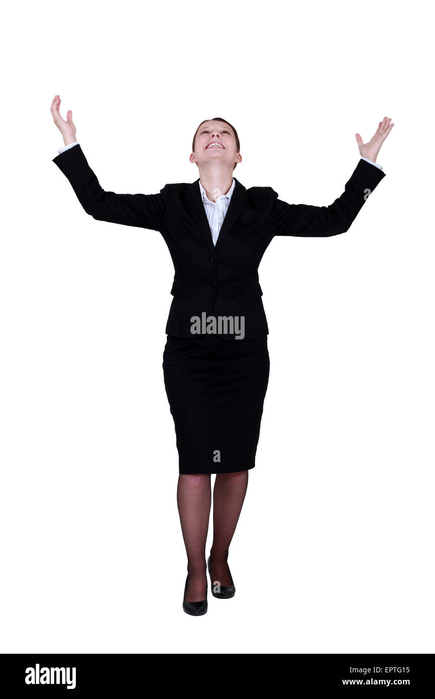 Business woman hoping for a miracle Stock Photo - Alamy
