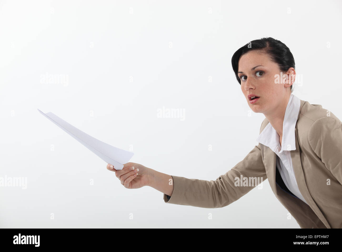Shocked at a piece of paper Stock Photo - Alamy