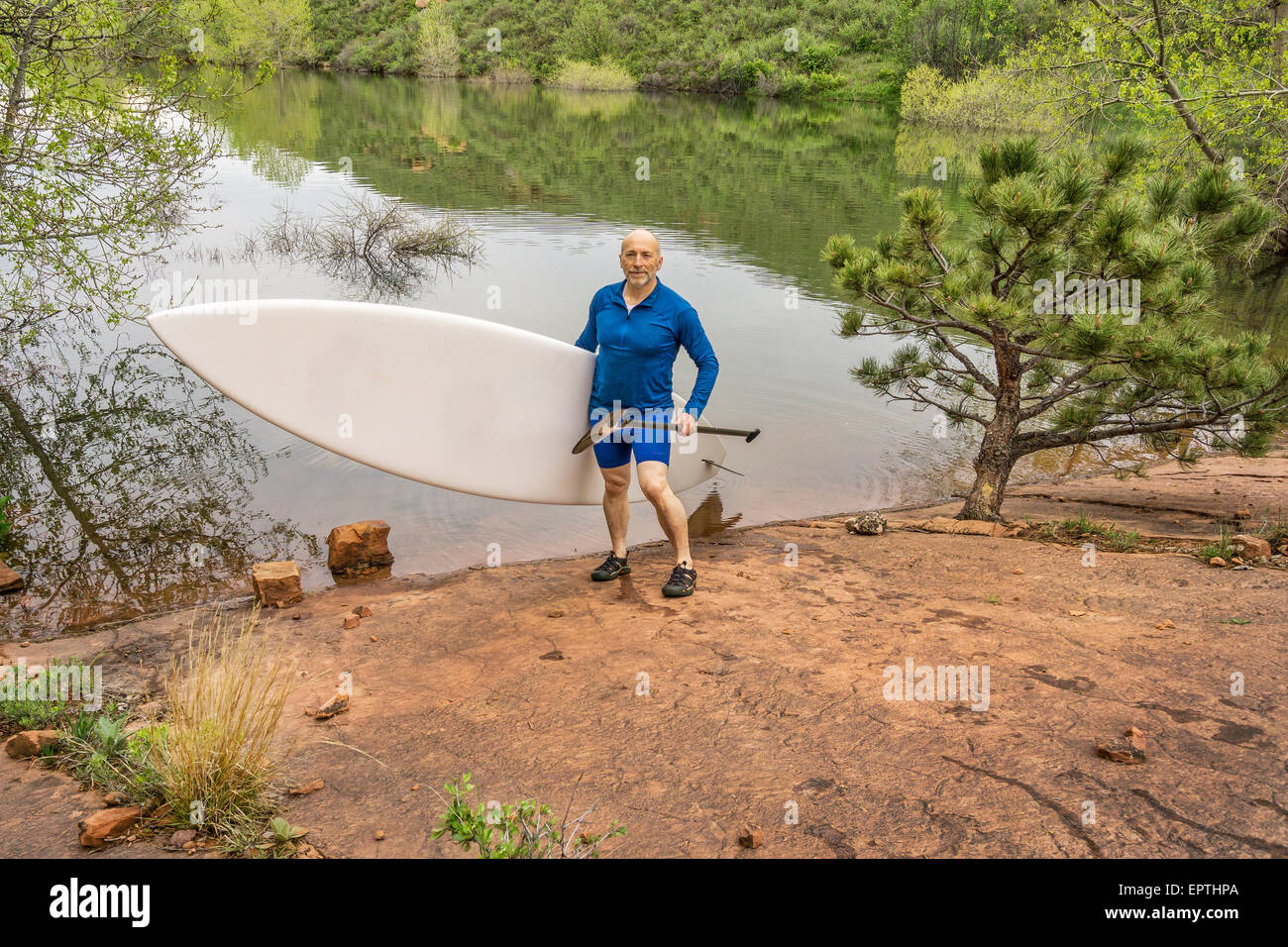 Male paddler carrying stand hi-res stock photography and images - Alamy