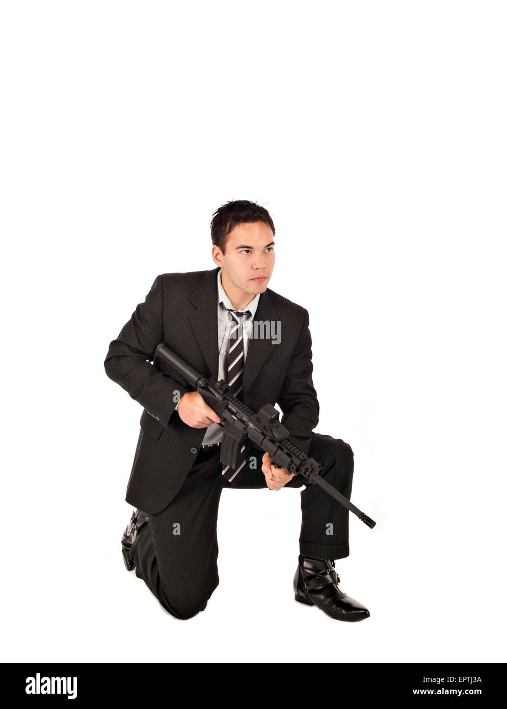 White man kneeling with an AR-15 Semi automatic gun Stock Photo - Alamy