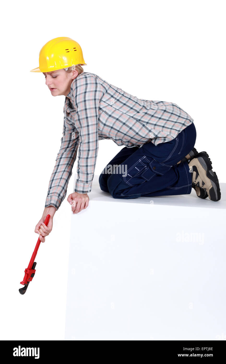 Working with a spanner Stock Photo - Alamy