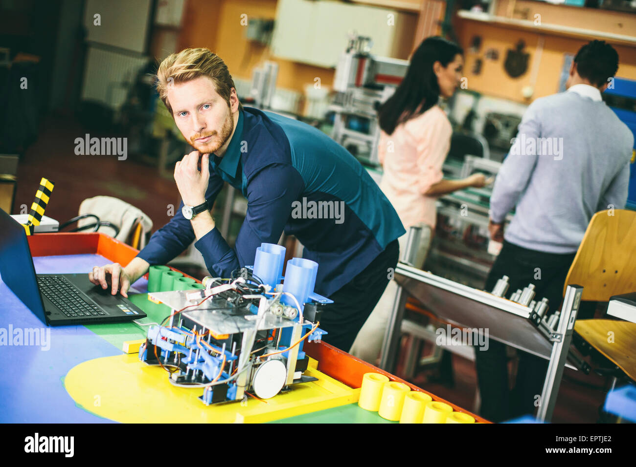 Young people in the robotics classroom Stock Photo - Alamy