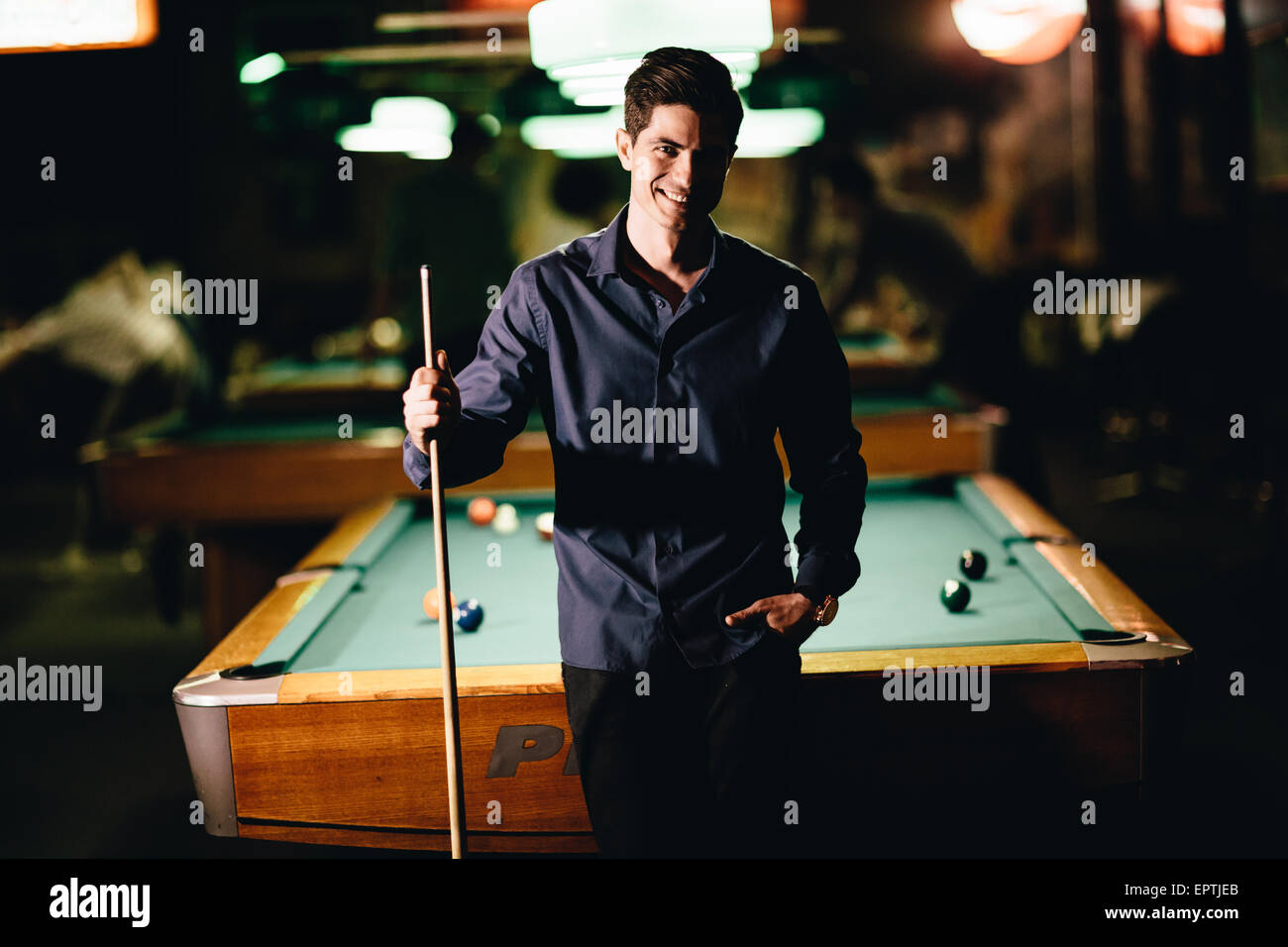 Guy playing billiards hi-res stock photography and images - Alamy