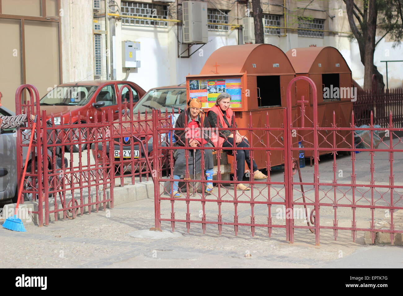 Two women sat down in the street hi-res stock photography and images ...