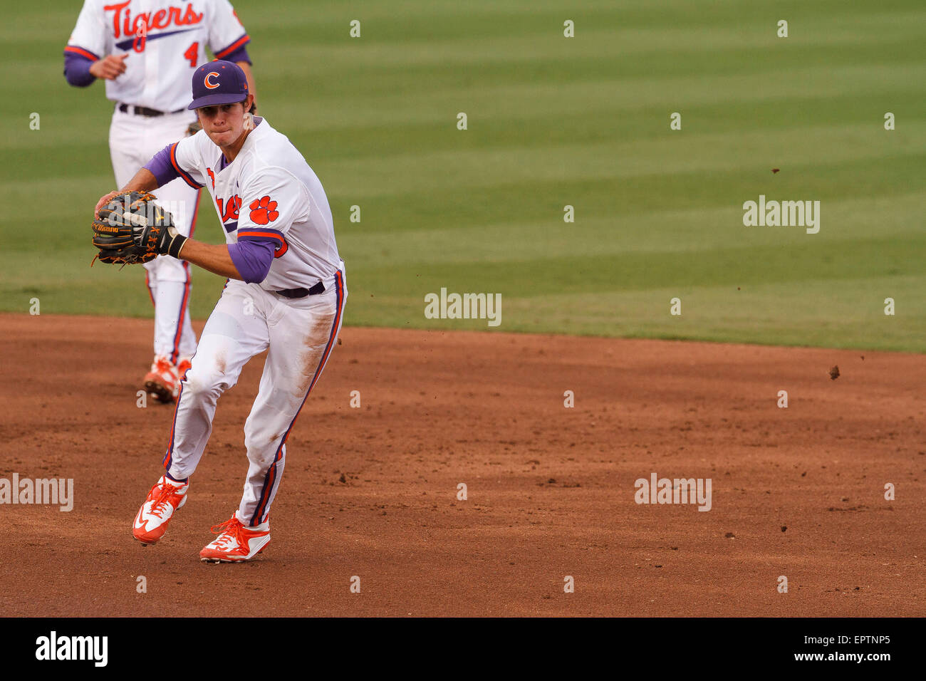 infielder Tyler Krieger (3) of the Clemson Tigers makes the throw to ...