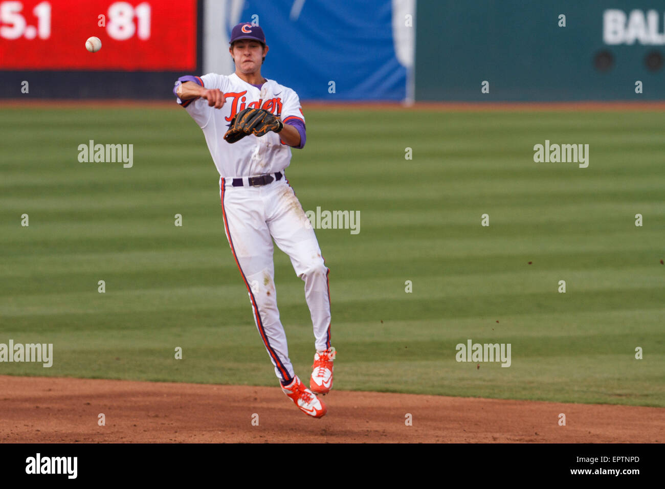 infielder Tyler Krieger (3) of the Clemson Tigers makes a bad throw and ...