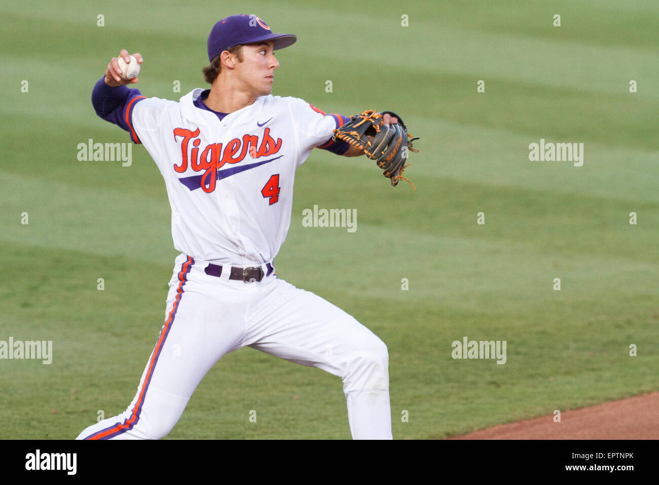 infielder Eli White (4) of the Clemson Tigers makes the out at first in ...