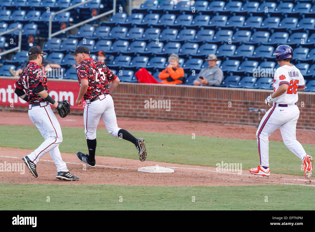 pitcher Robert Strader (25) of the Louisville Cardinals makes the out ...