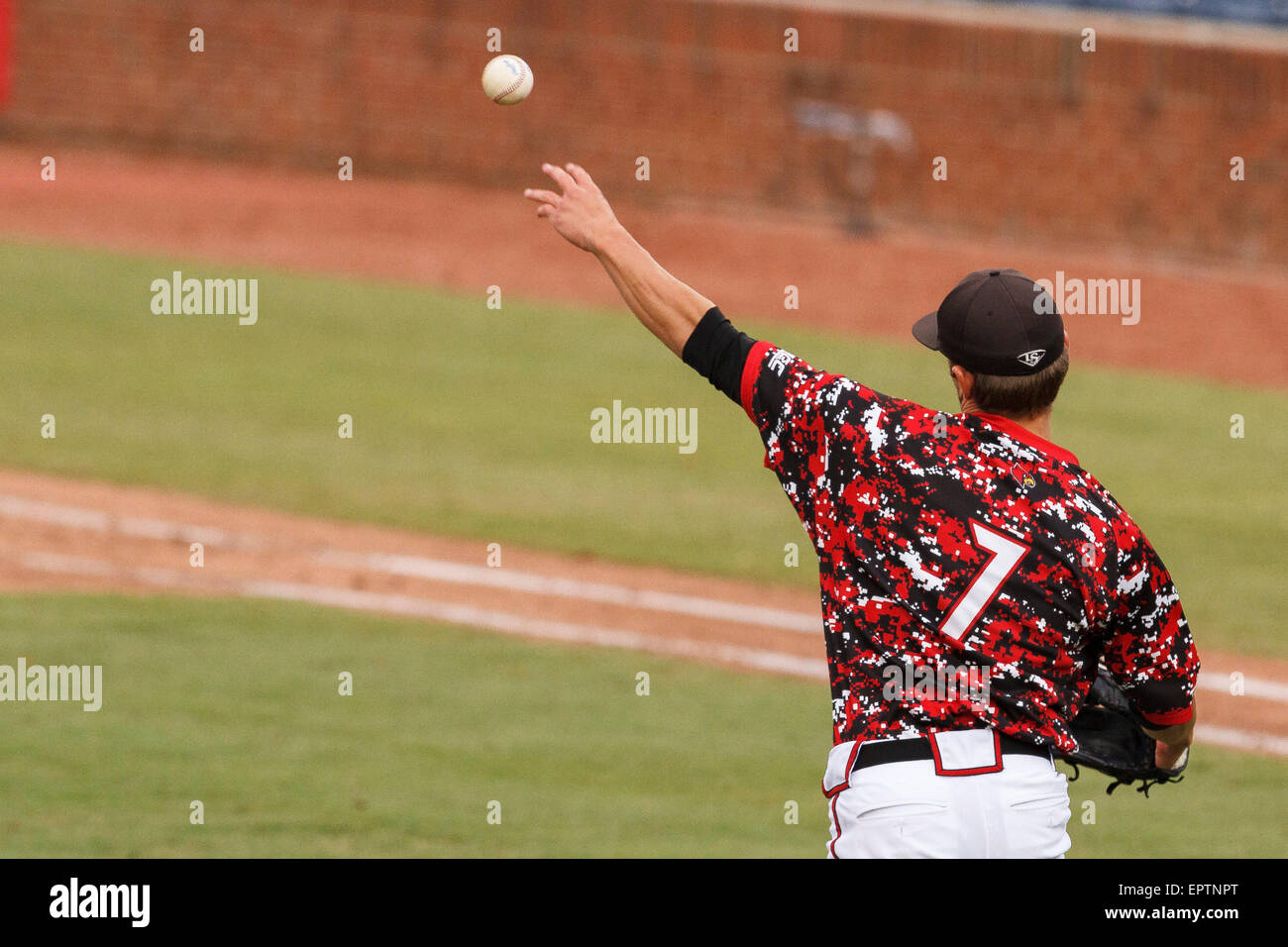 pitcher Butch Baird (7) of the Louisville Cardinals makes the throw to ...
